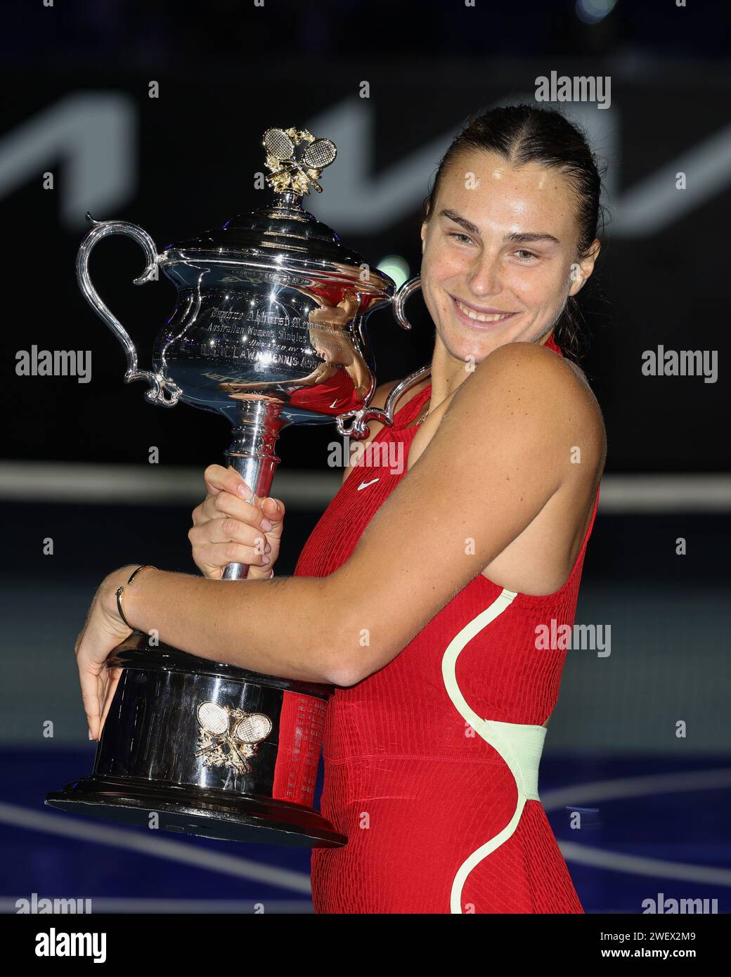 January 27, 2024: 2nd seed ARYNA SABALENKA of Belarus poses with the Daphne Akhurst Memorial Cup ...