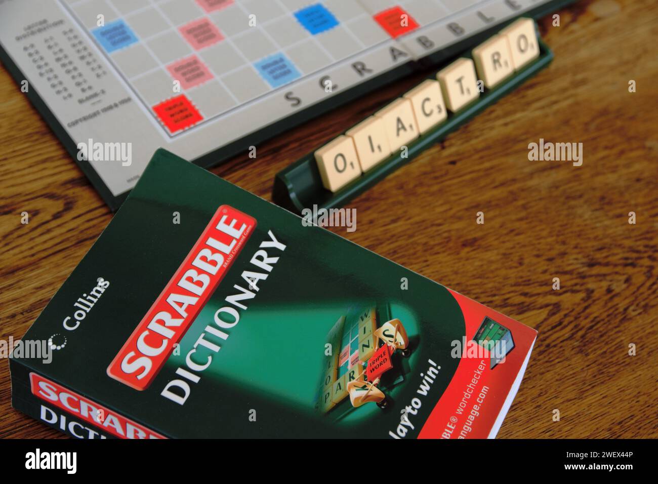Scrabble board game. Spelling word play, making words out of tiles on ...