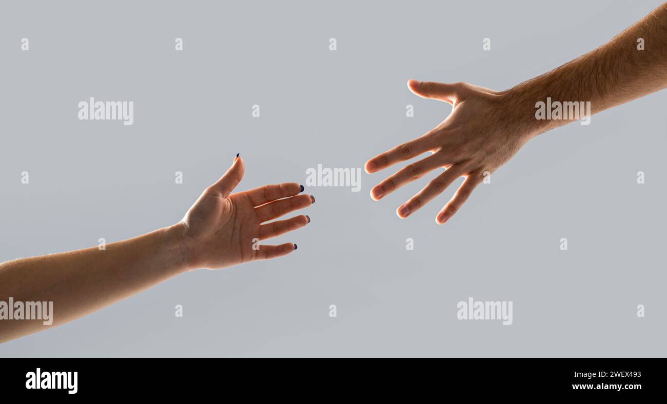 Hands man and woman reaching to each other, support. Giving a helping ...