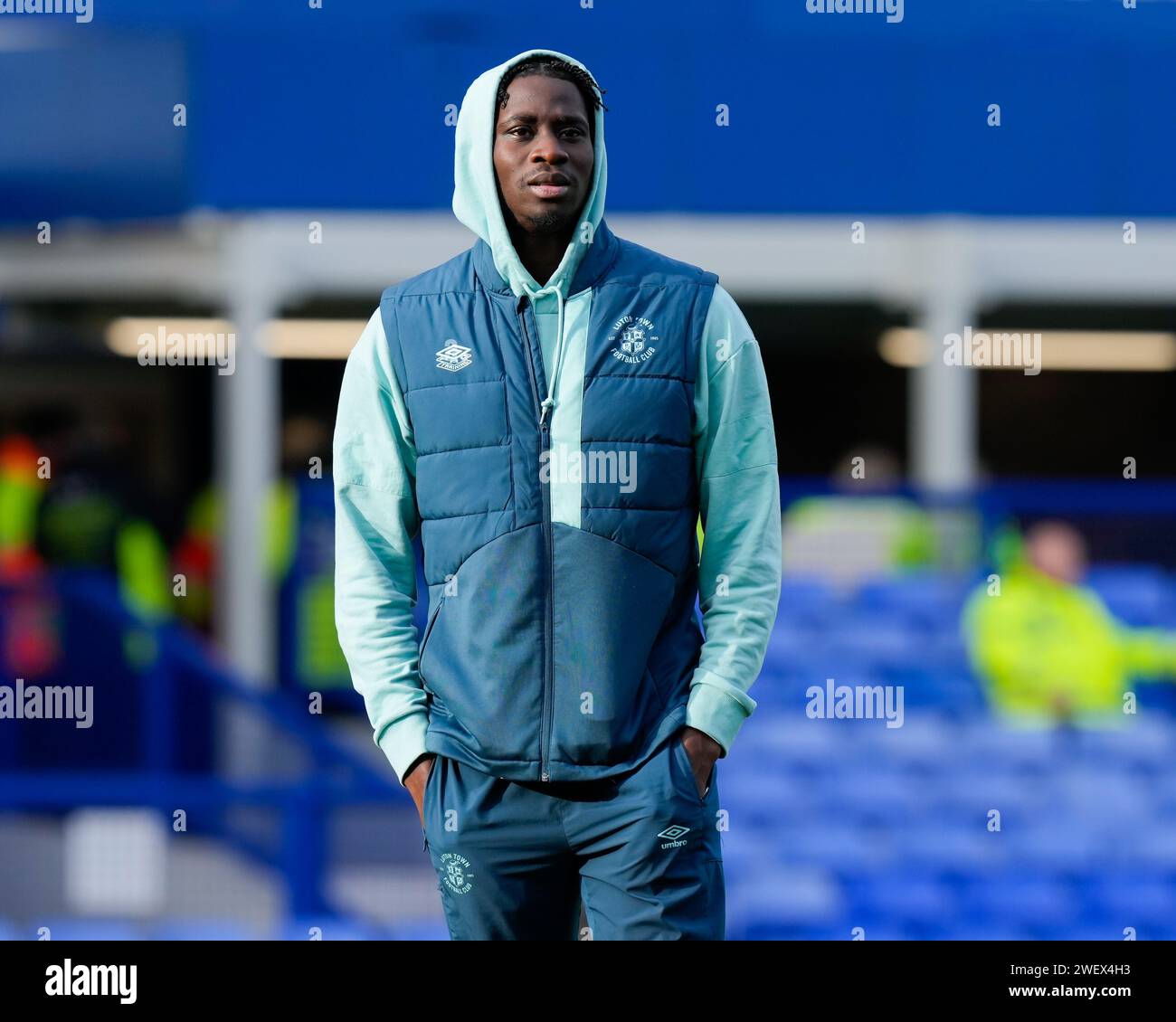 Issa Kaboré of Luton Town inspects the pitch ahead of the match, during ...