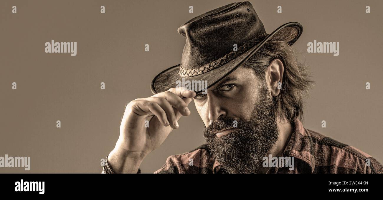 American cowboy. Leather. Cowboy Hat. Portrait of young man wearing ...