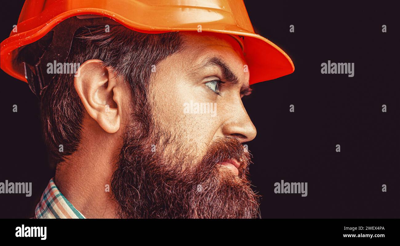 Man builders, industry. Bearded man worker with beard in building ...