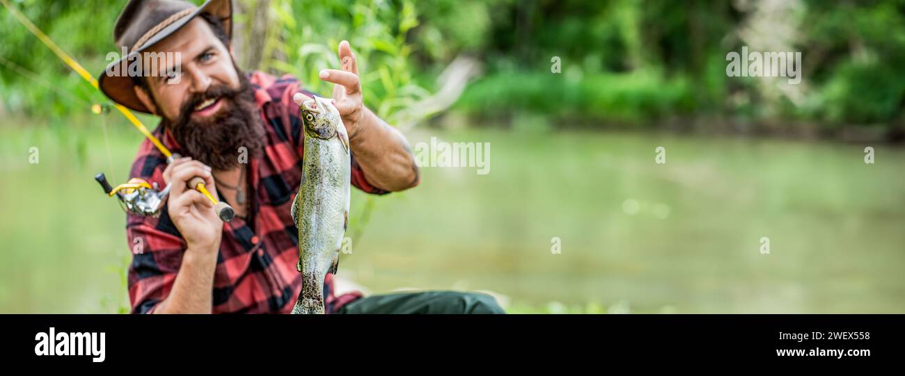 Angler with fishing trophy. Fisherman and trout. Fishing backgrounds ...