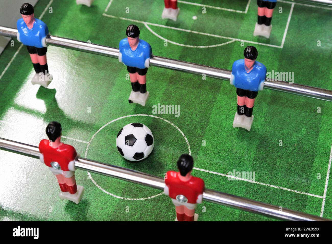 Start Of A Table Top Football With Red And Blue Teams Stock Photo - Alamy
