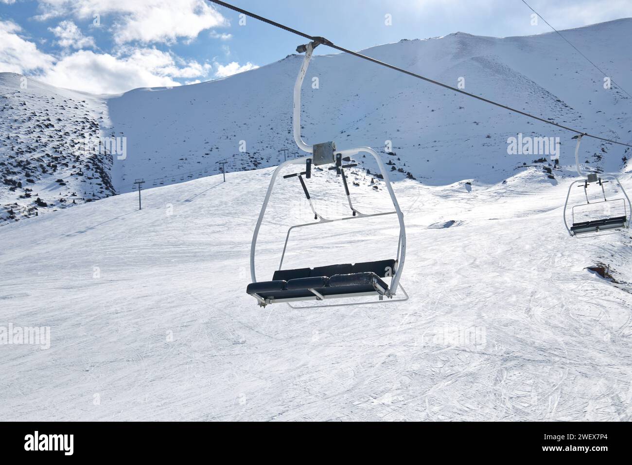 Cable car construction, Empty three seater chair against the backdrop ...
