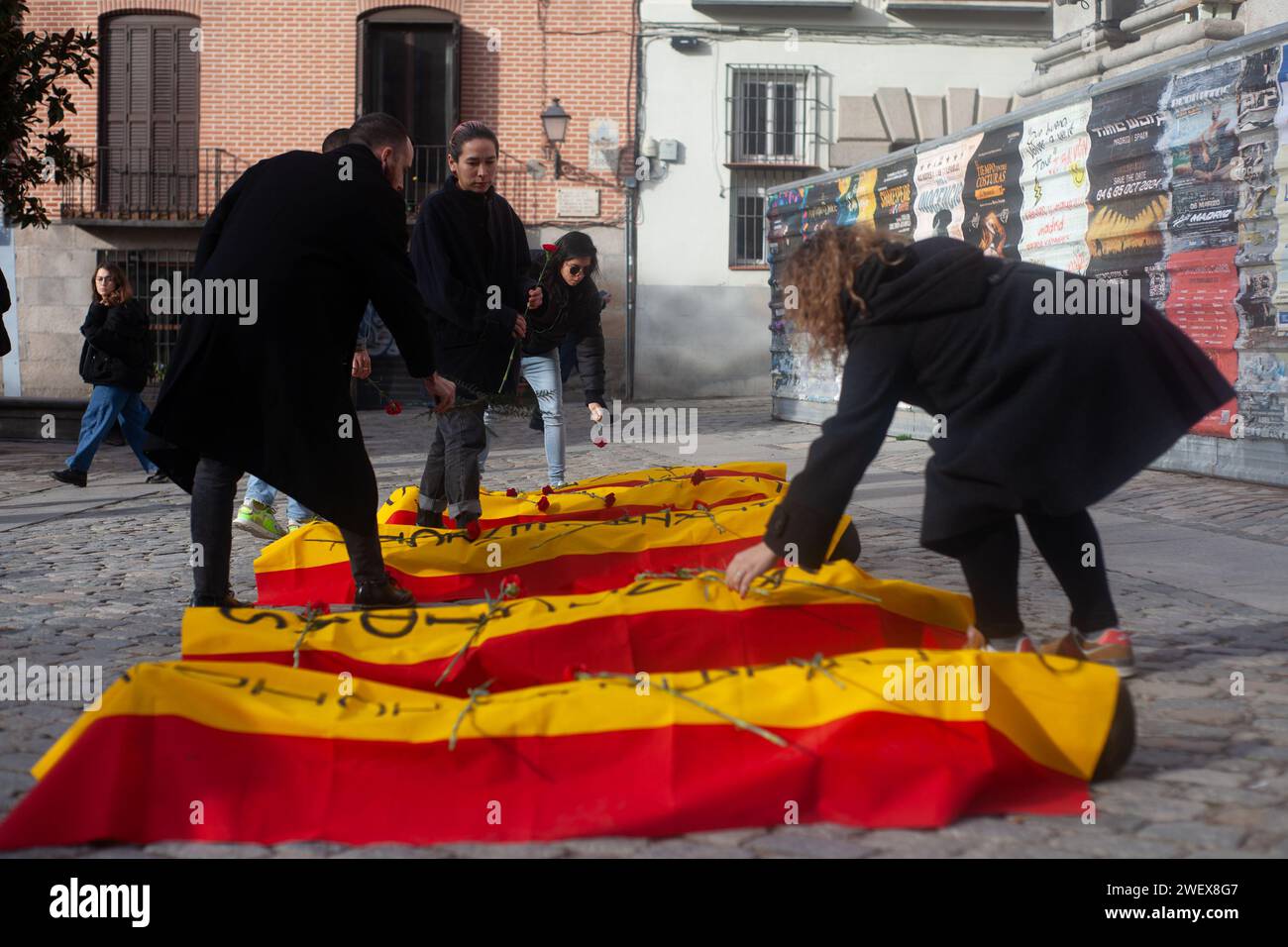 Madrid, Spain. 27th Jan, 2024. People place flowers on femen Spain ...