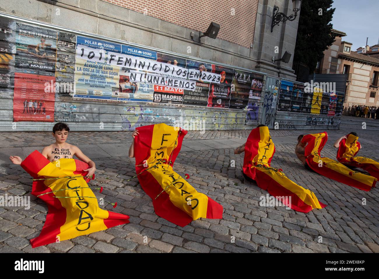 Madrid, Spain. 27th Jan, 2024. Femen Spain activists lay on the ground ...