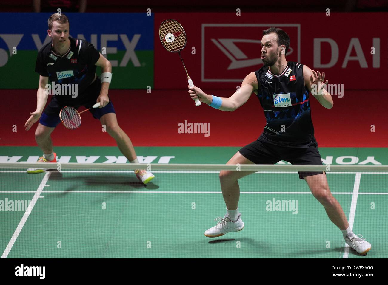 Denmark's Kim Astrup, left, and Anders Skaarup Rasmussen play against ...