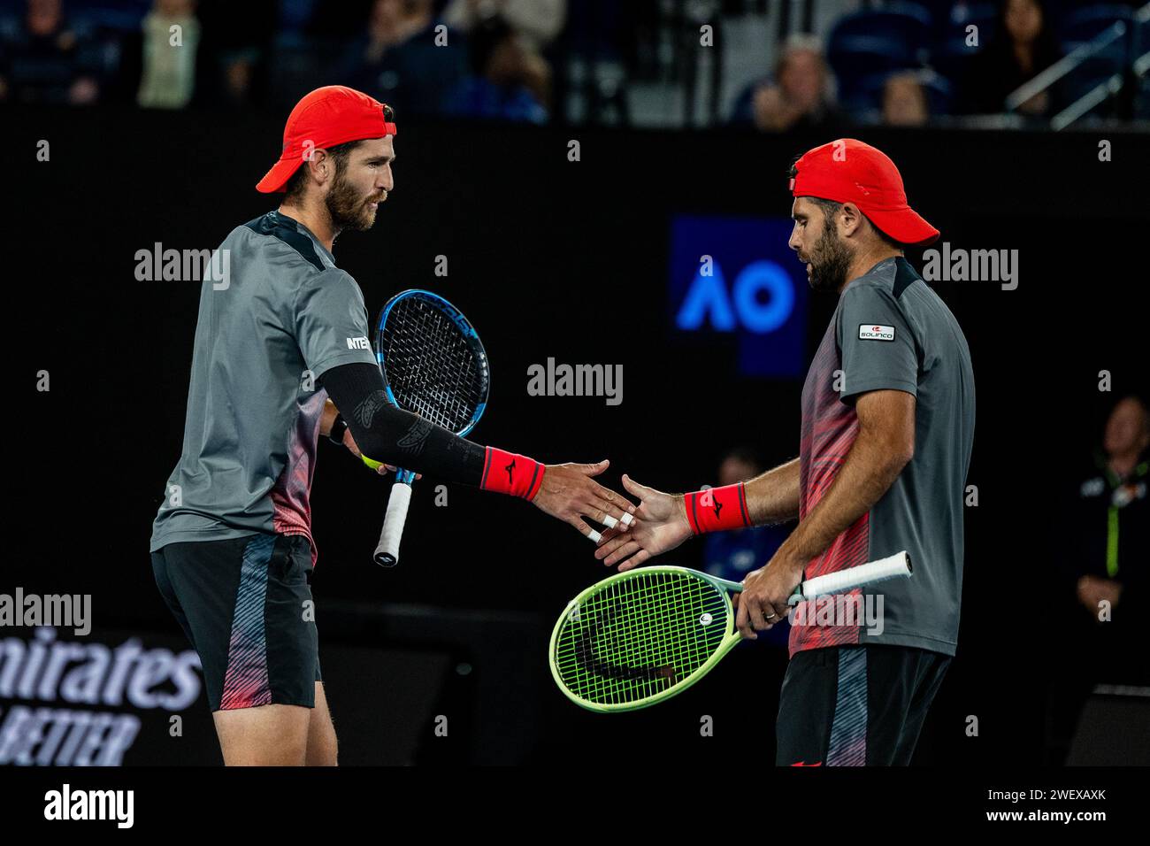 Melbourne, Australia. 27th Jan, 2024. Simone Bolelli (R)/Andrea Vavassori celebrate scoring with ...