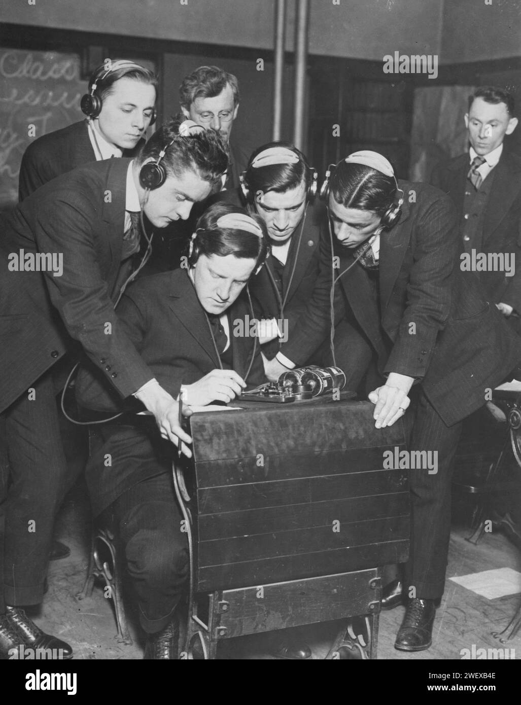 Photo shows a student at Stuyvesant Evening High School (seated ...
