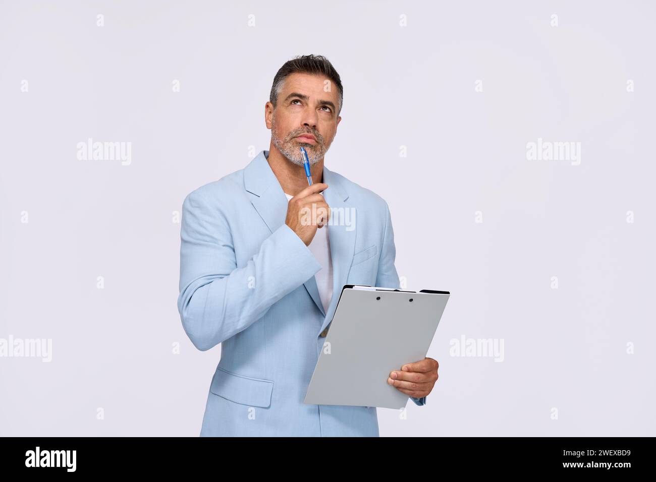Serious thoughtful mid aged business man thinking isolated on white ...