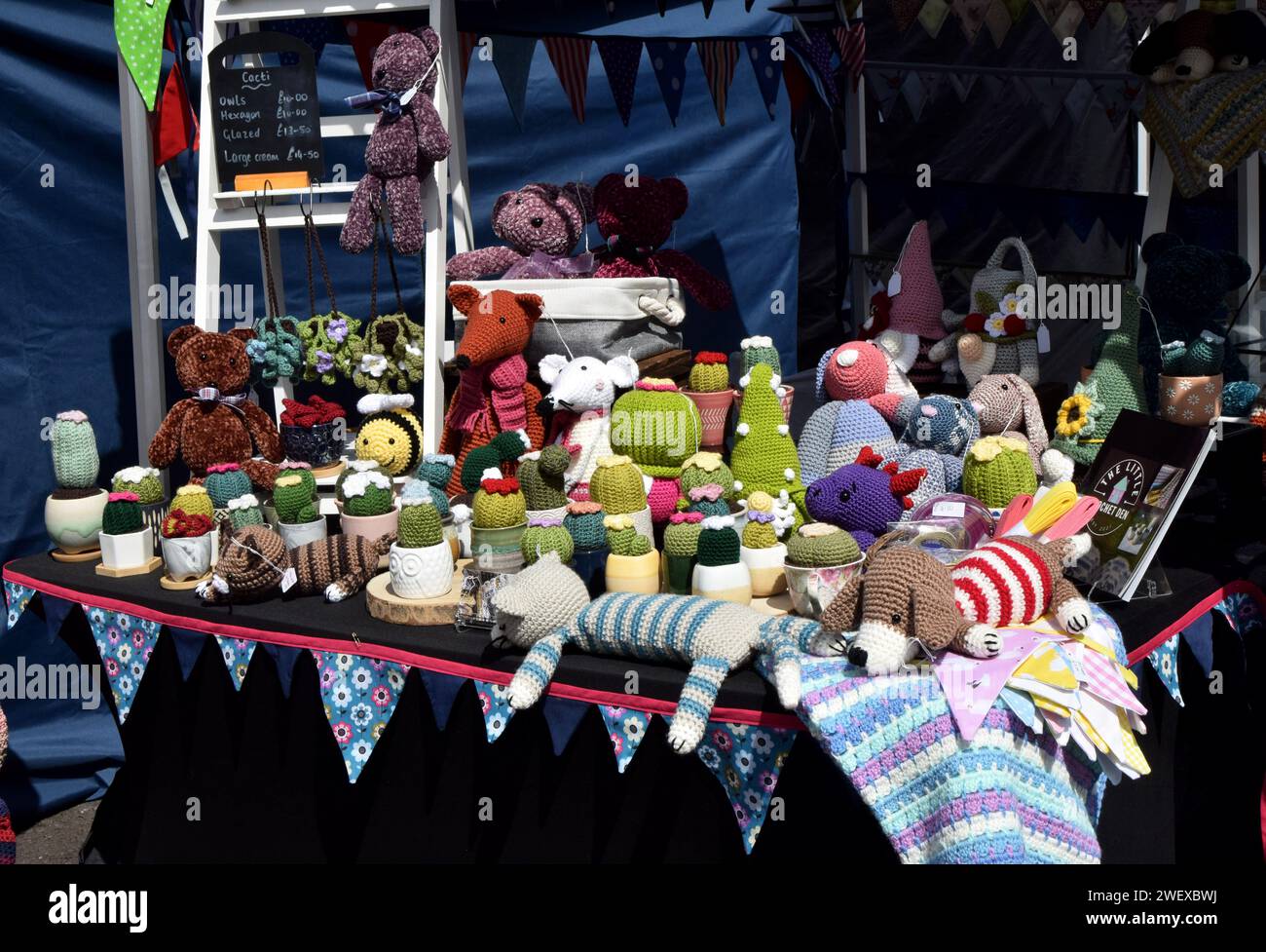 crocheted animals and cacti on market stall Stock Photo - Alamy