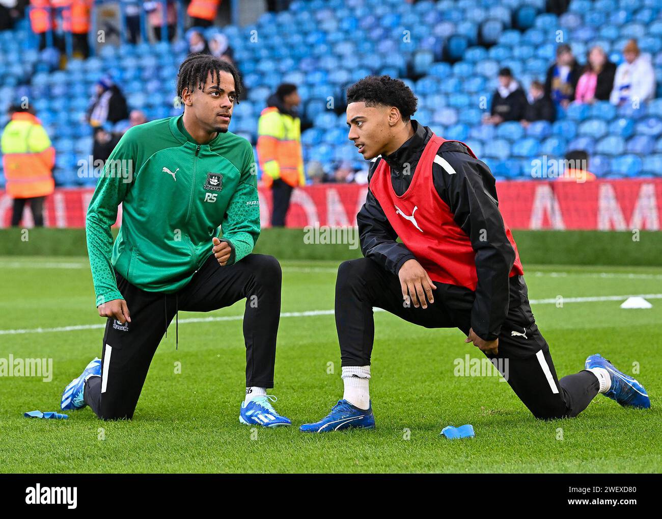Caleb Roberts of Plymouth Argyle warming up with Freddie Issaka of ...