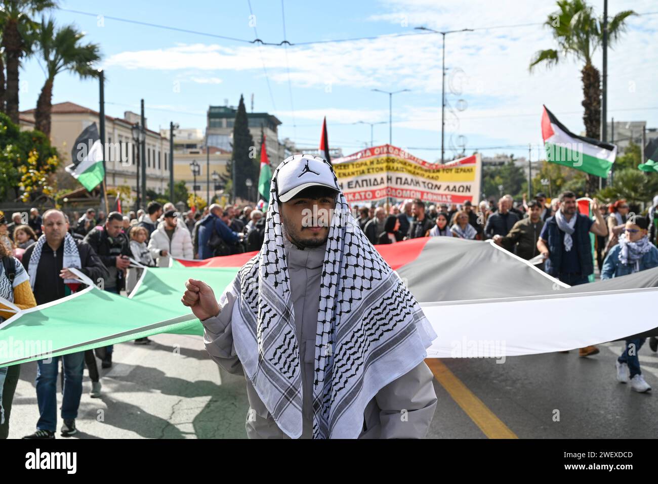 Pro-Palestinian demonstration Protesters march holding banners and ...