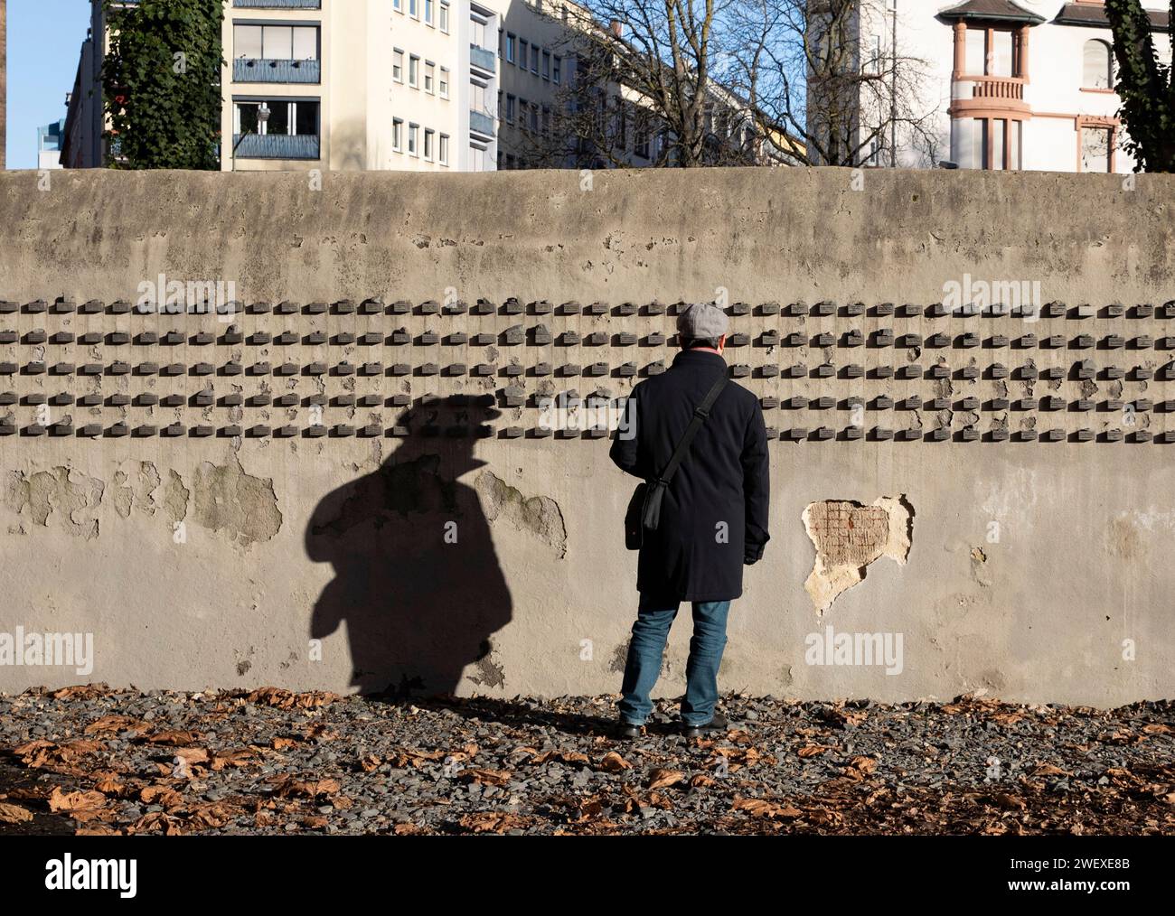 Frankfurt, Germany. 27th Jan, 2024. A man looks at the wall of an Old ...