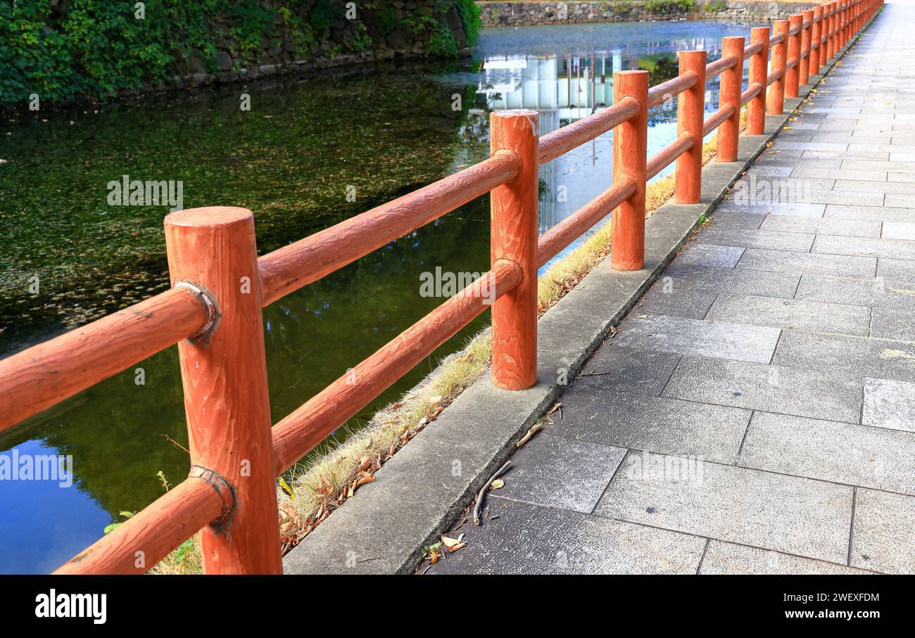 Concrete fence made to look like wood along the Canalside walkway Stock ...