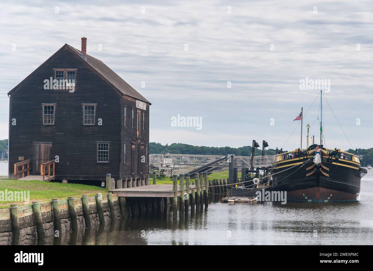 the historic sail loft building and friendship of salem ship docked at ...
