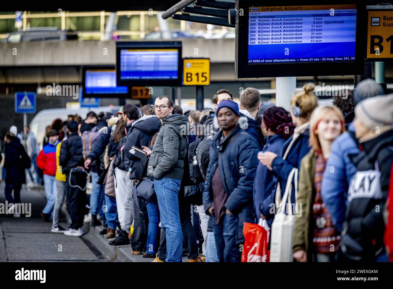 SCHIPHOL - Busy at the bus stop at Schiphol. Stranded travelers at ...
