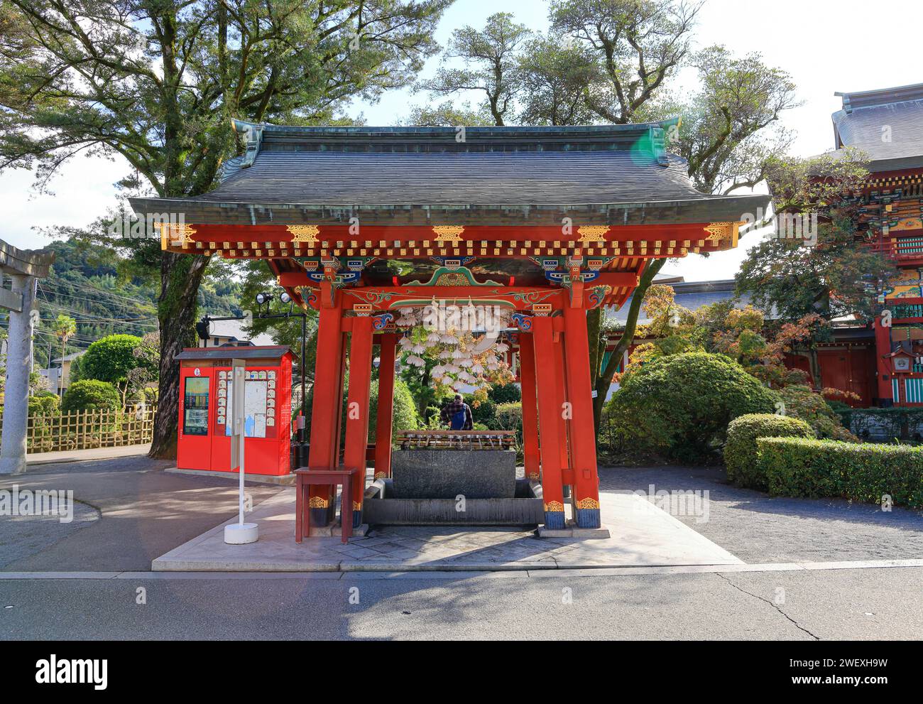 Building with a pond for people who visit the shrine for clean mouth ...