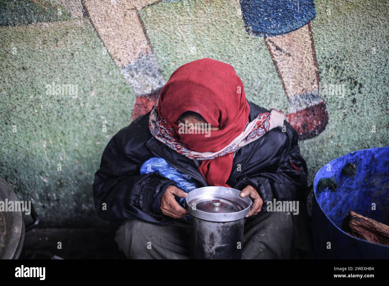 Rafah, Palestinian Territories. 27th Jan, 2024. A Palestinian waits to ...