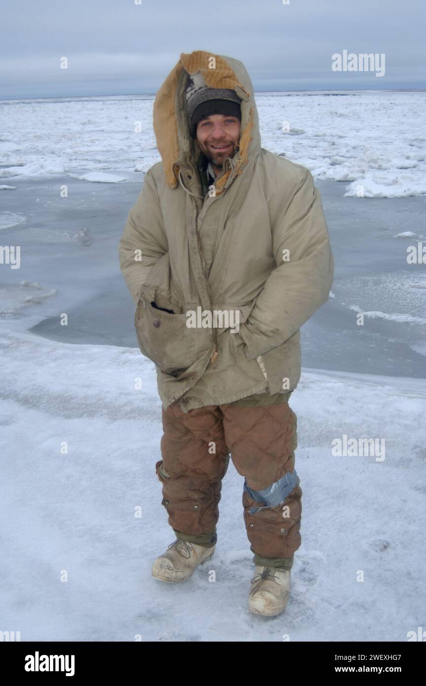 photographer Steven Kazlowski along the Arctic coast during freeze up ...