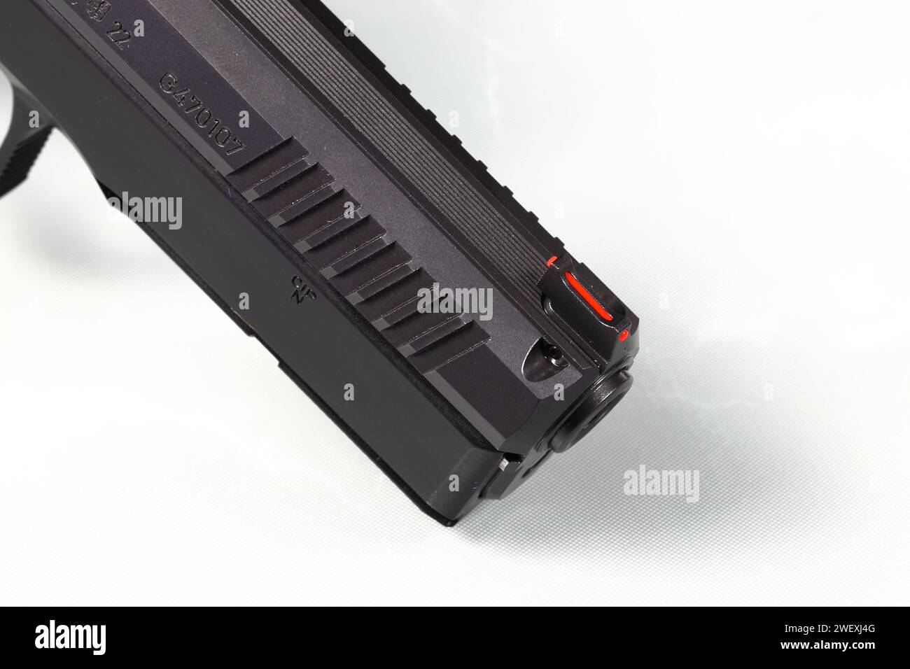 Fiber optic front gun sight on a semi automatic handgun Stock Photo - Alamy