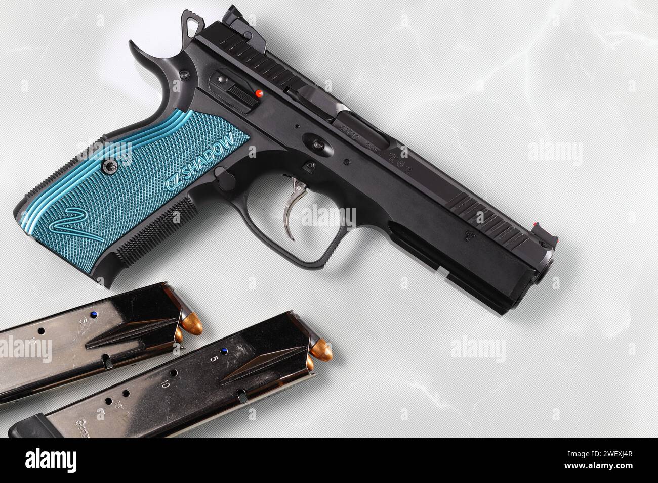 A CZ shadow 2 9 mm Luger sports pistol with a red dot sight, Automatic ...