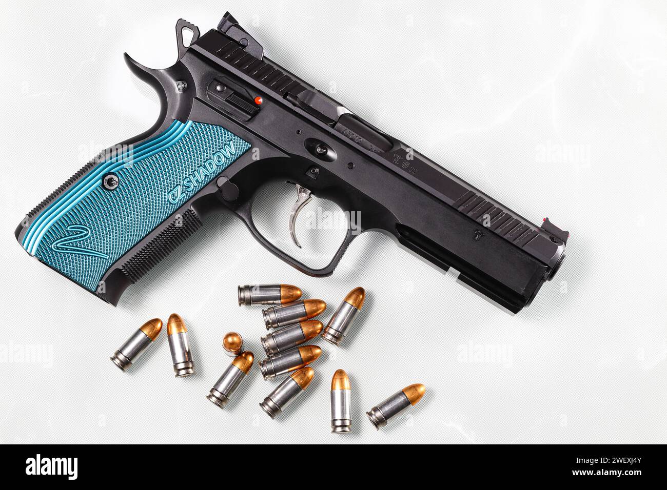 A CZ shadow 2 9 mm Luger sports pistol with a red dot sight, Automatic ...