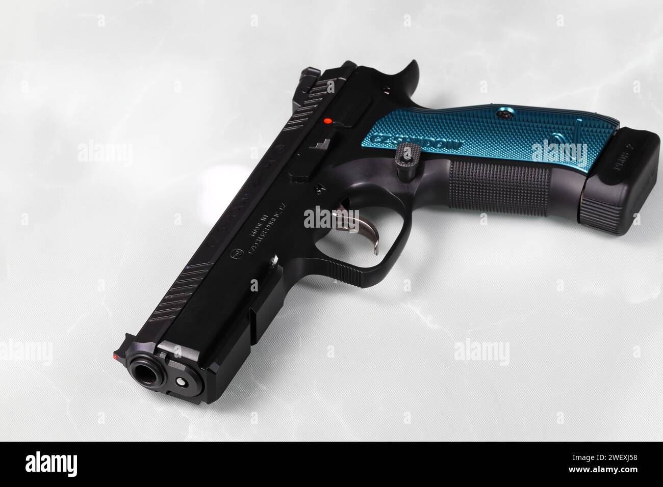 A CZ shadow 2 9 mm Luger sports pistol with a red dot sight, Automatic ...