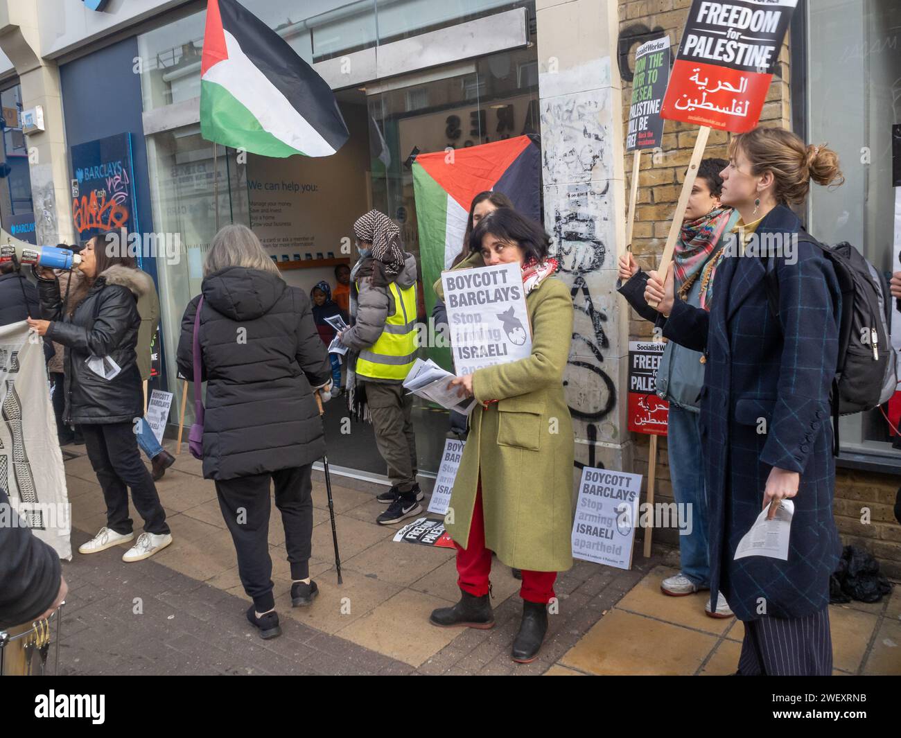 London, UK. 27 Jan 2024. A protest at Barclay's Peckham branch in a day ...