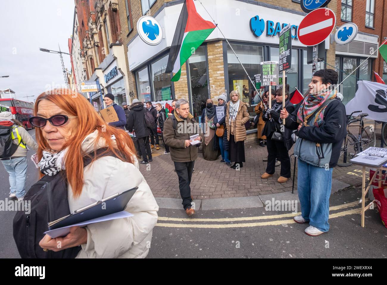 London, UK. 27 Jan 2024. A protest at Barclay's Peckham branch in a day ...