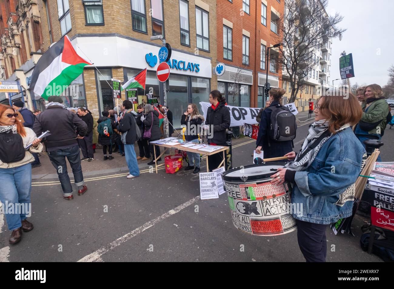 London, UK. 27 Jan 2024. A protest at Barclay's Peckham branch in a day ...