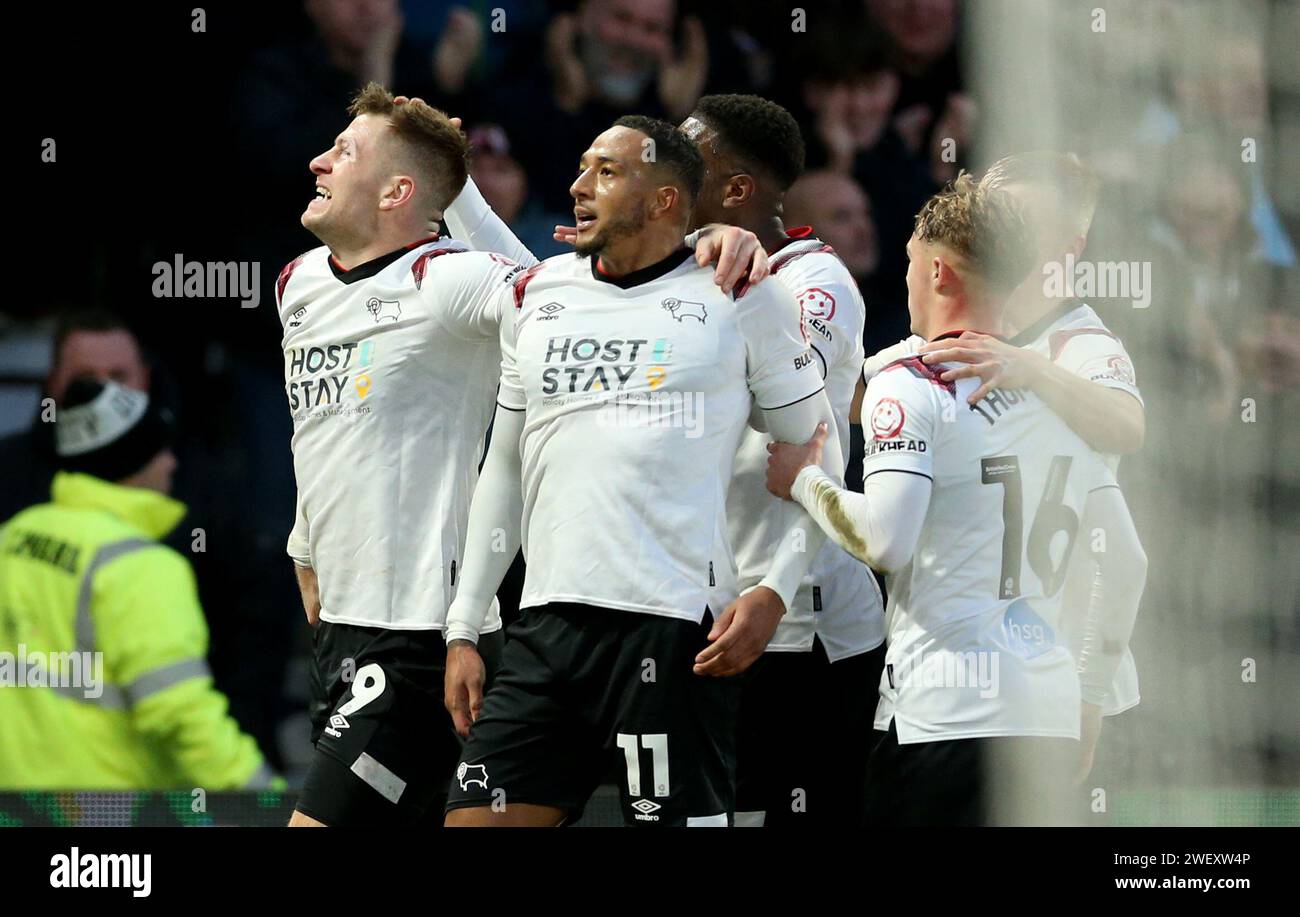 Derby County's James Collins (left) celebrates scoring his sides second ...