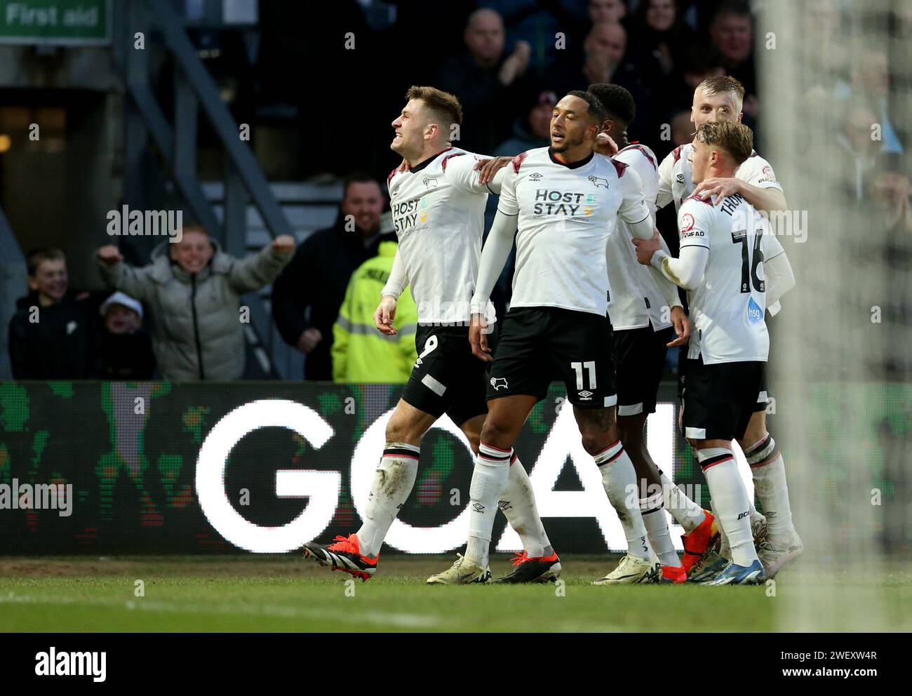 Derby County's James Collins (left) celebrates scoring his sides second ...