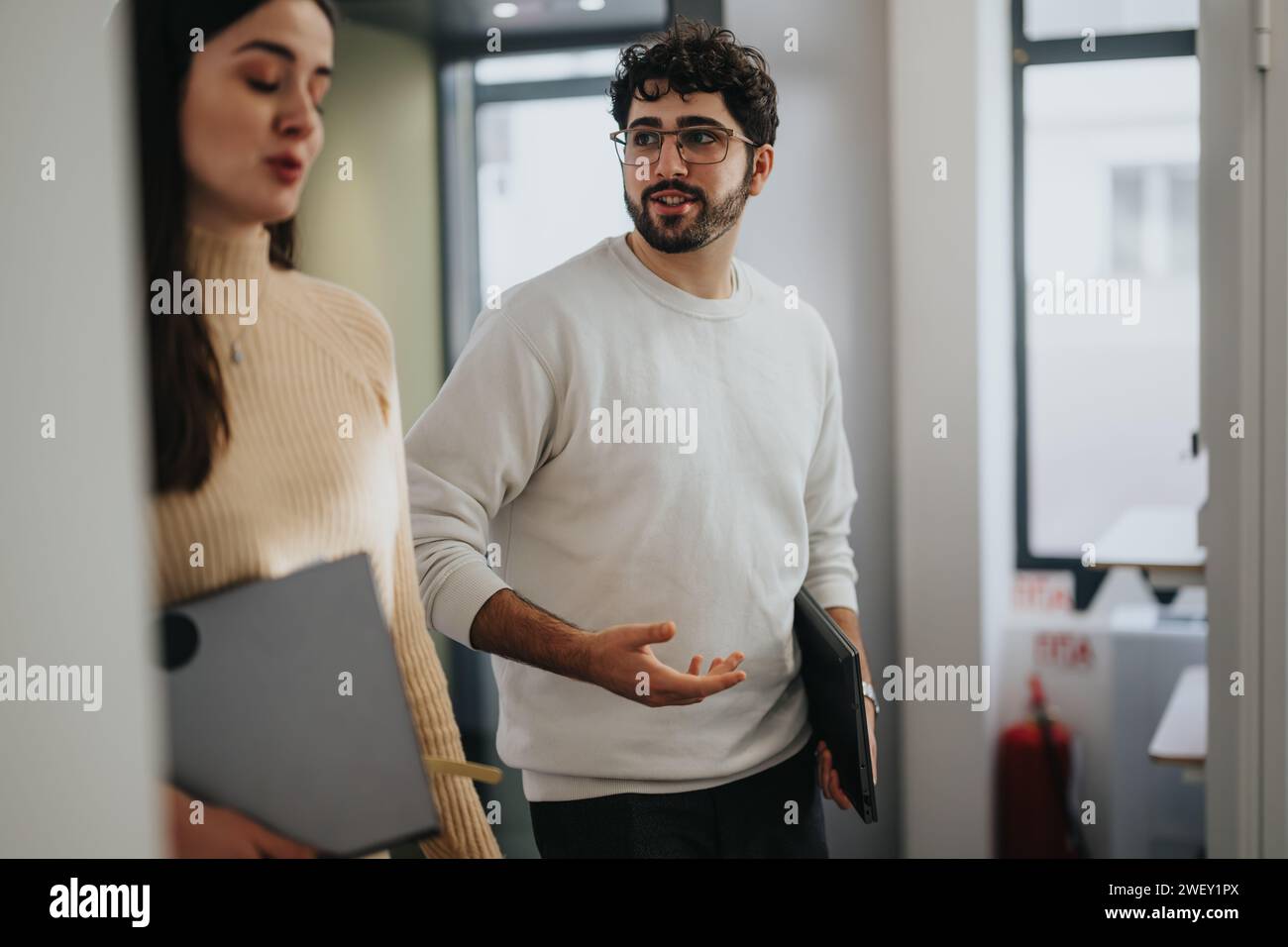 Business professionals discussing marketing strategies in a modern ...