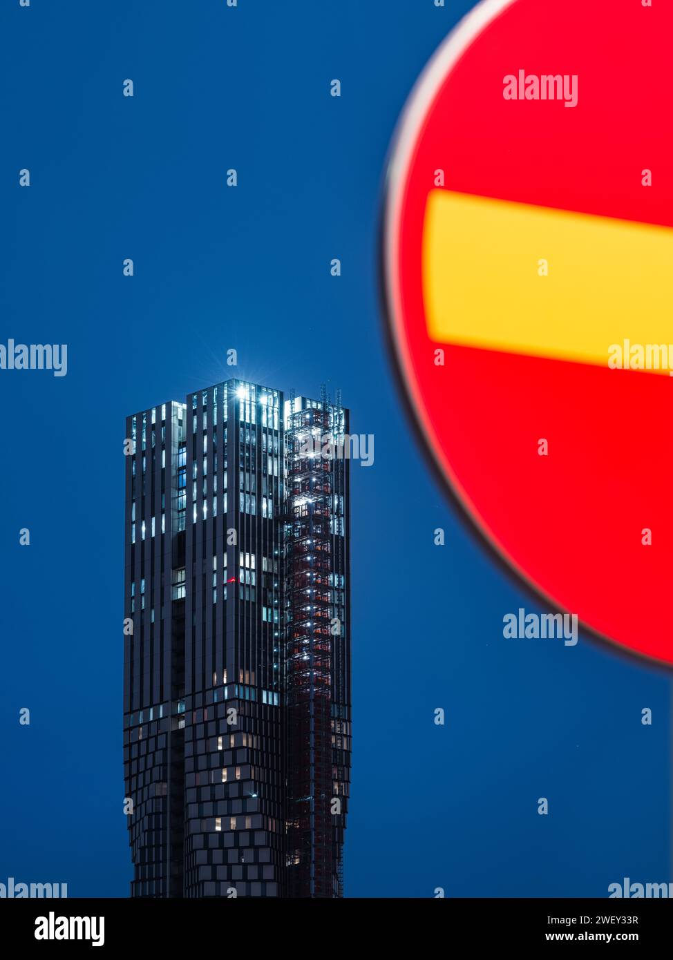 The photo showcases a striking contrast between a vibrant red no entry ...