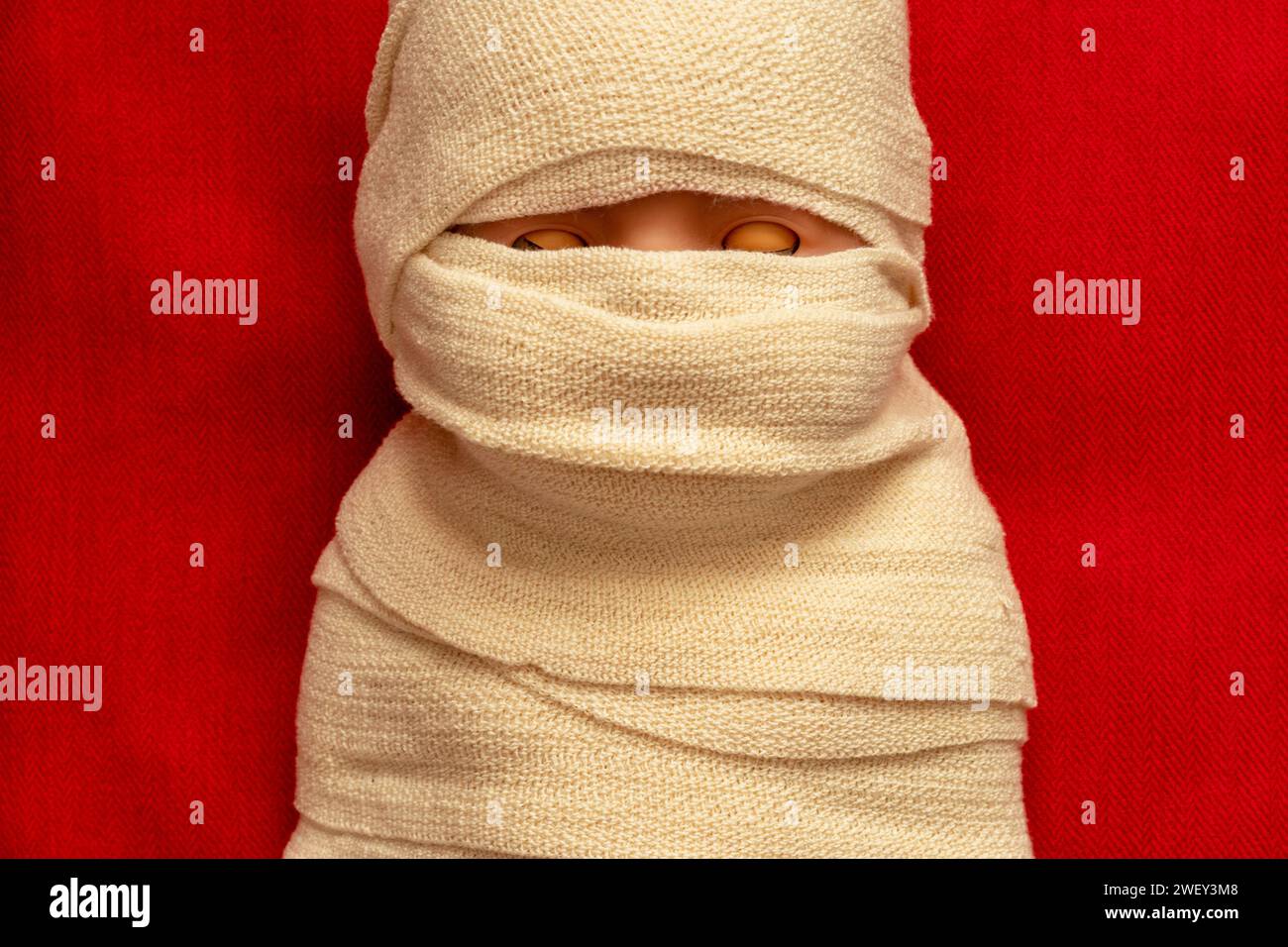 The man is wrapped in a cloth. The body is shrouded in a veil. The ...