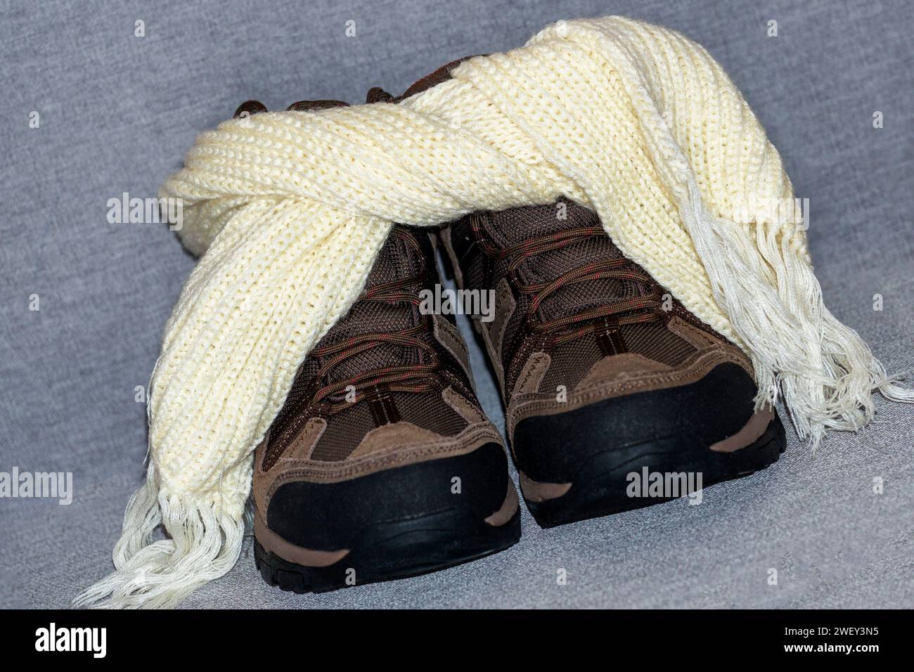 Boots wrapped with a scarf hi-res stock photography and images - Alamy