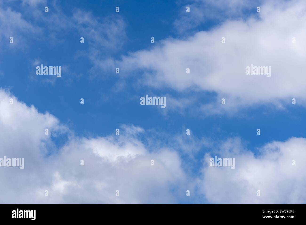 Beautiful blue sky, clouds, nature background. Nice sunny weather Stock Photo - Alamy