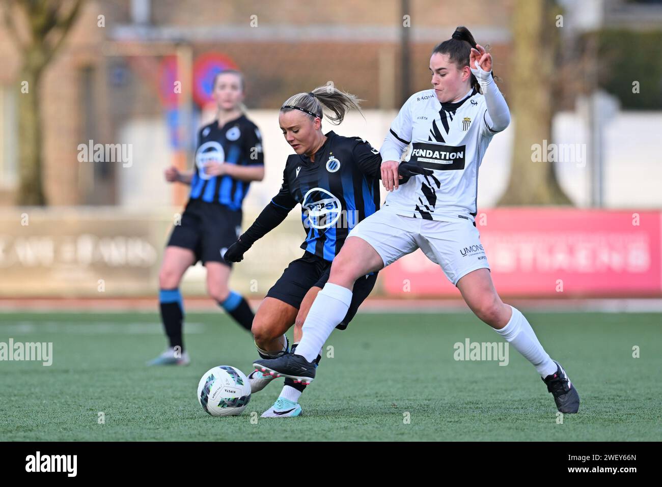 Knokke, Belgium. 27th Jan, 2024. Fleur Pauwels (17) of Club YLA pictured in a duel with ...