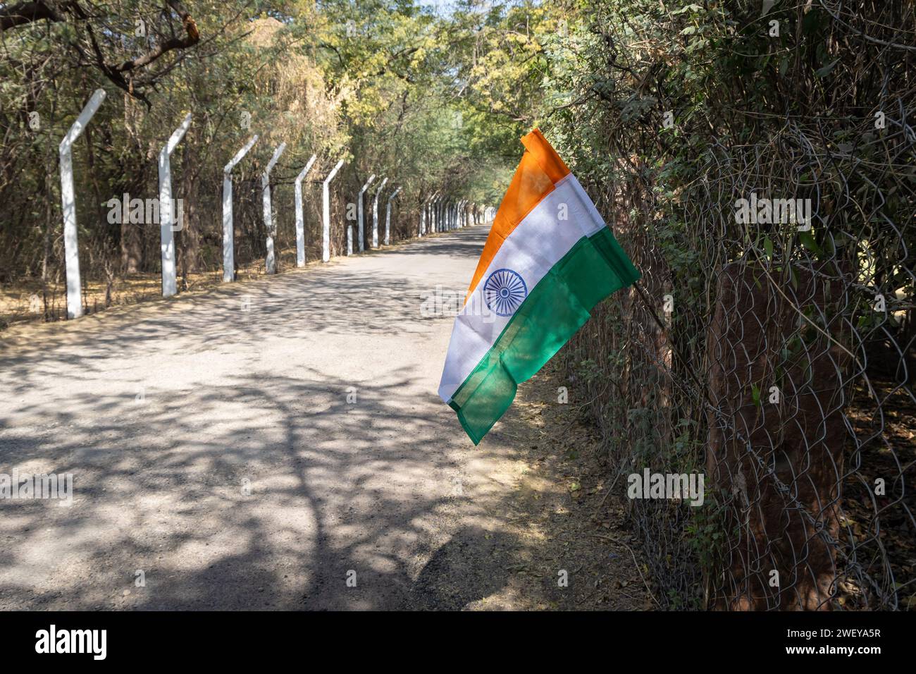 indian tricolor national flag hanging at remote location at day from ...