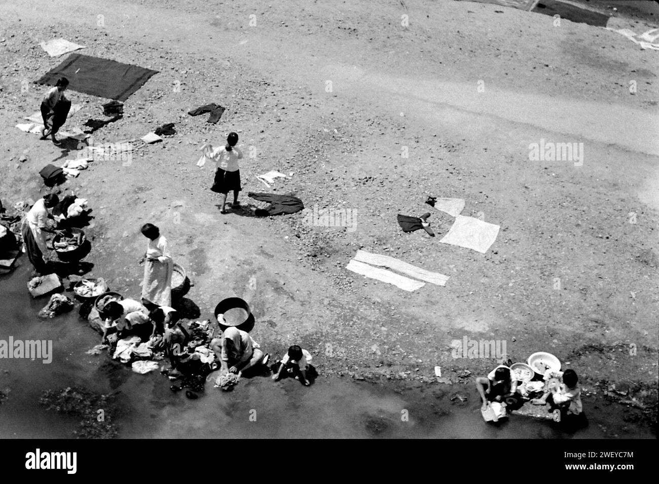 Villagers washing Clothes in river South Korea 1953 Stock Photo - Alamy