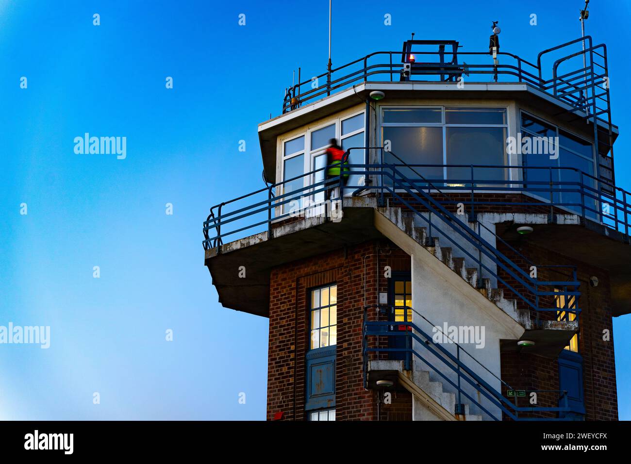 Worker enters control tower at Manchester Barton Aerodrome - City ...