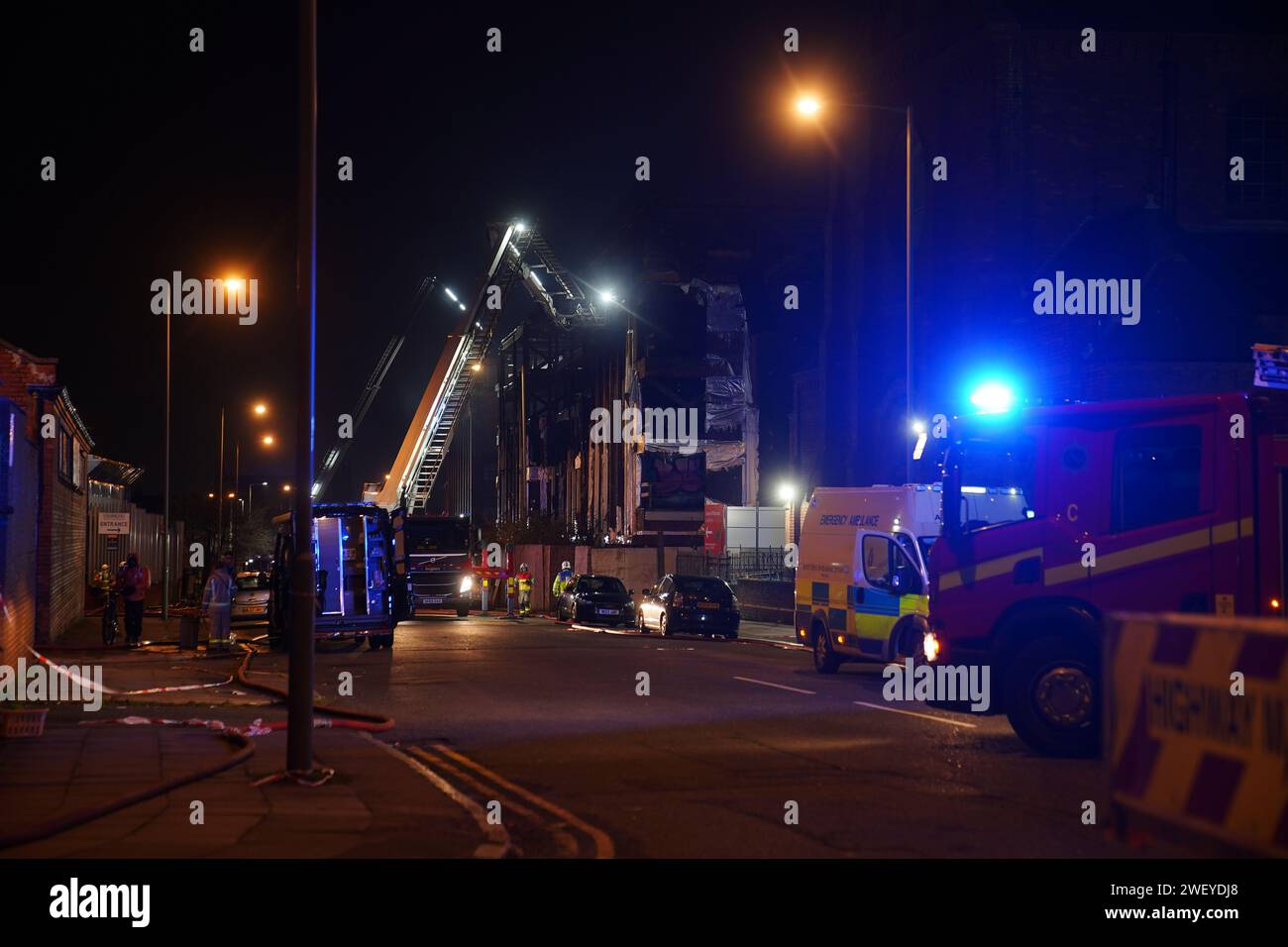 Firefighters at the scene following a fire on Fox Street in Liverpool ...