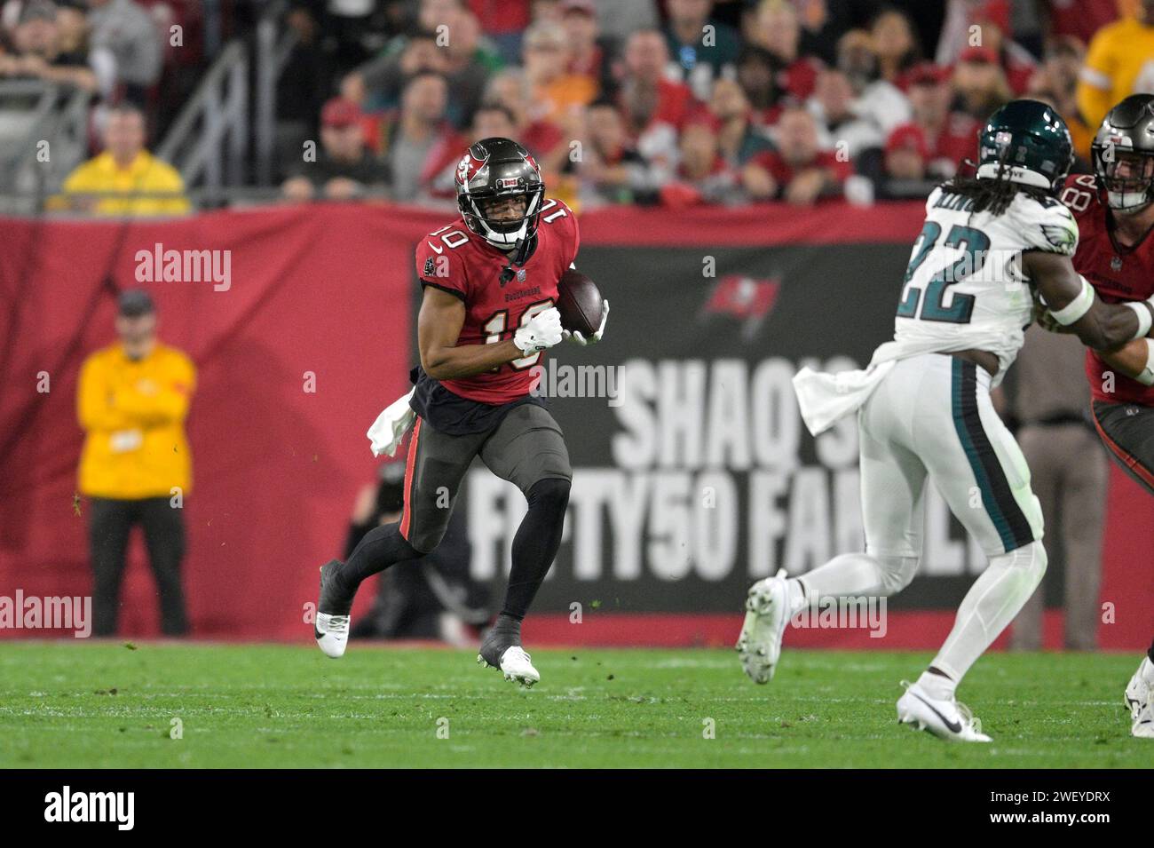 Tampa Bay Buccaneers wide receiver Trey Palmer (10) runs after catching ...