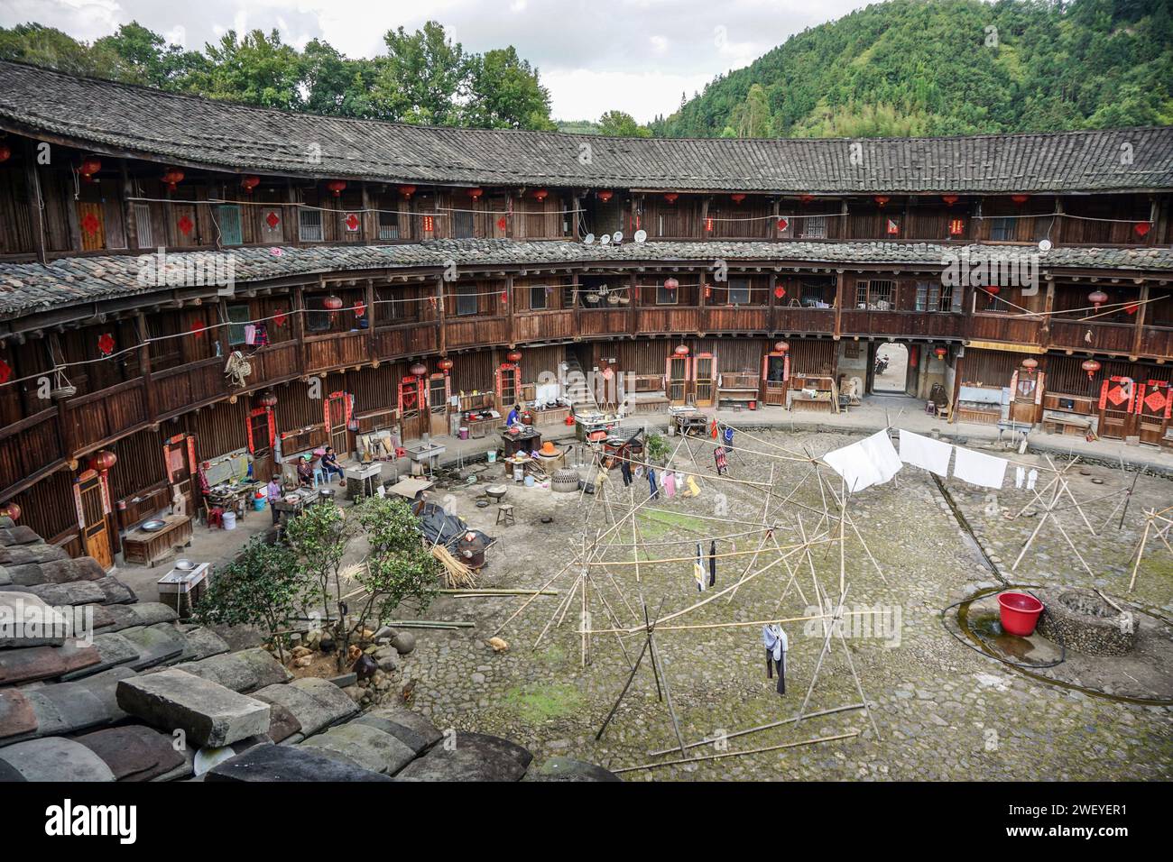 Vernacular Tulou buildings made of rammed earth and timber in Hekeng ...