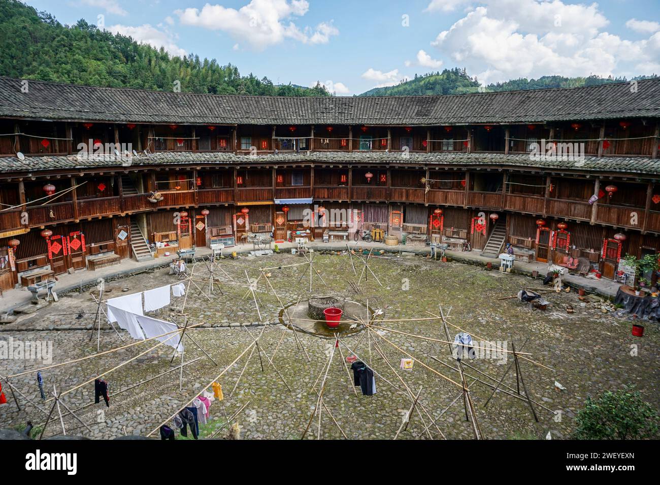Vernacular Tulou buildings made of rammed earth and timber in Hekeng ...