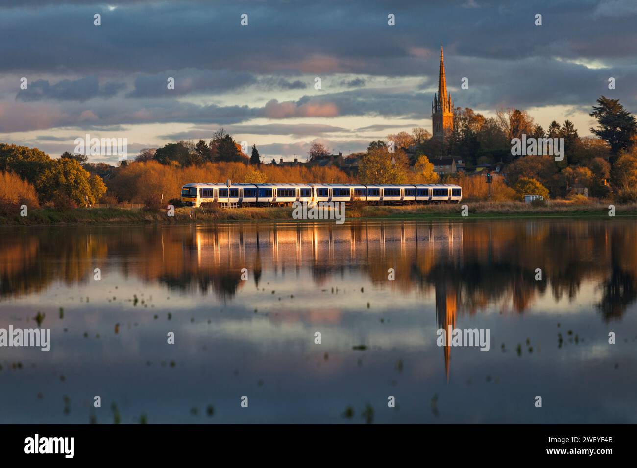 Chiltern Railways class 165 Turbo train reflected in the flooded fields ...