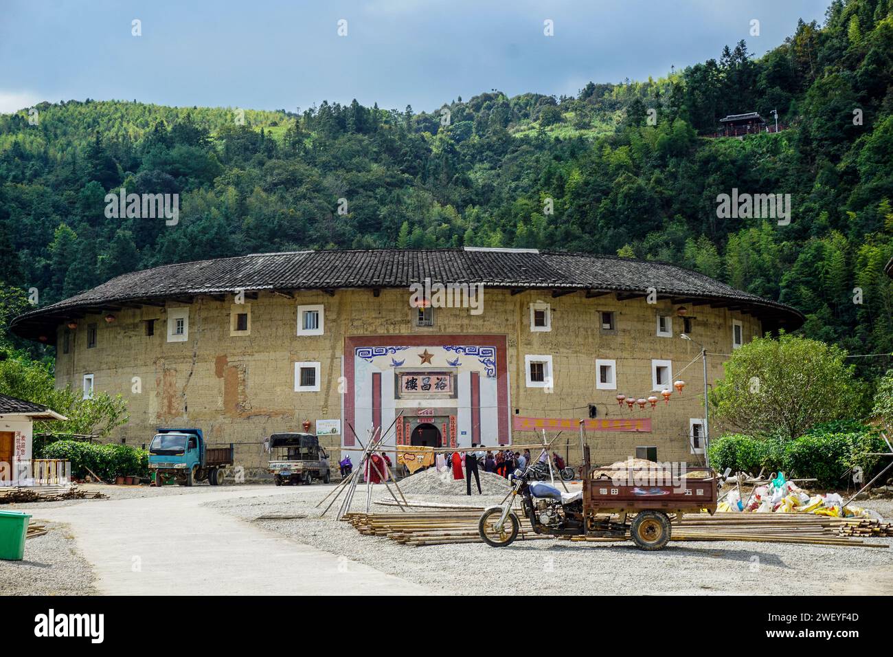 Vernacular Tulou buildings made of rammed earth and timber in Hekeng ...