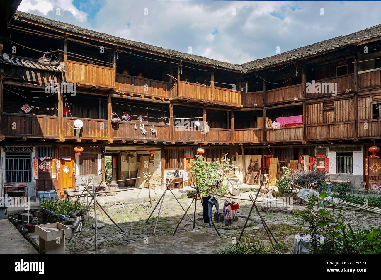 Rectangular and round Hakka Tulou (building made of rammed earth and ...